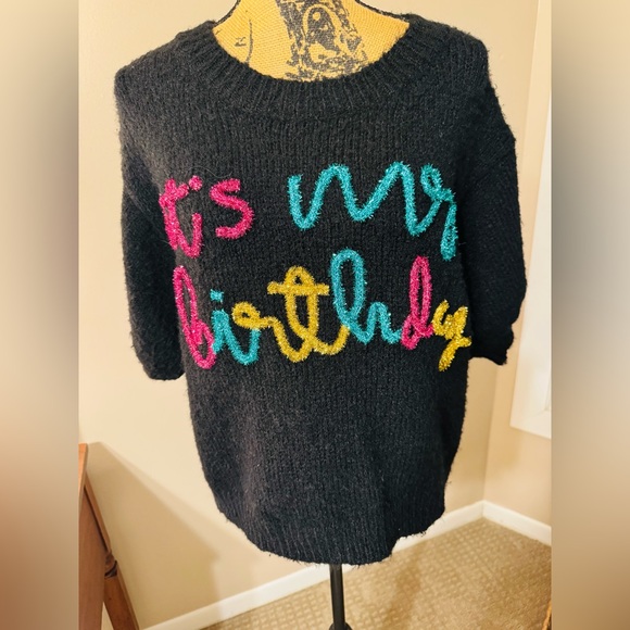 BiBi | Sweaters | Bibi Black Sweater With Pink Blue And Yellow Text ...